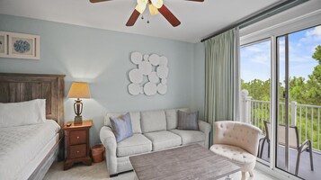 Apartamento em Condomínio Fechado, 1 cama king-size e sofá-cama (Lasata Grand Sand Dollar) | Sala de estar | Televisor 