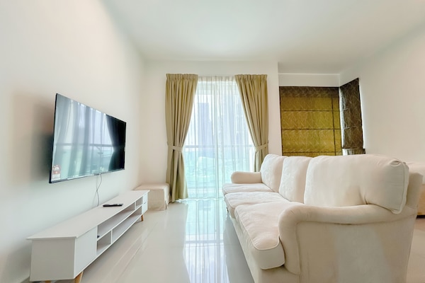 Apartamento luxo, 1 quarto | Área de estar