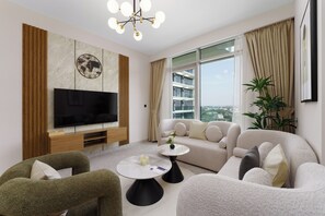 Apartamento luxo, 1 quarto, sacada | Sala de estar