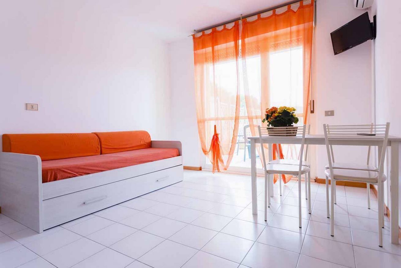 Two-room Apartment Of 45 Sqm, Consisting Of A Large Living Room/dining Area With Equipped Kitchenette And Sofa Bed With 2 Single Pull-out Beds, A Double Bedroom, Bathroom With Shower, Private Balcony Complete With Table And Chairs.equipped With:- Air Con - Carrara