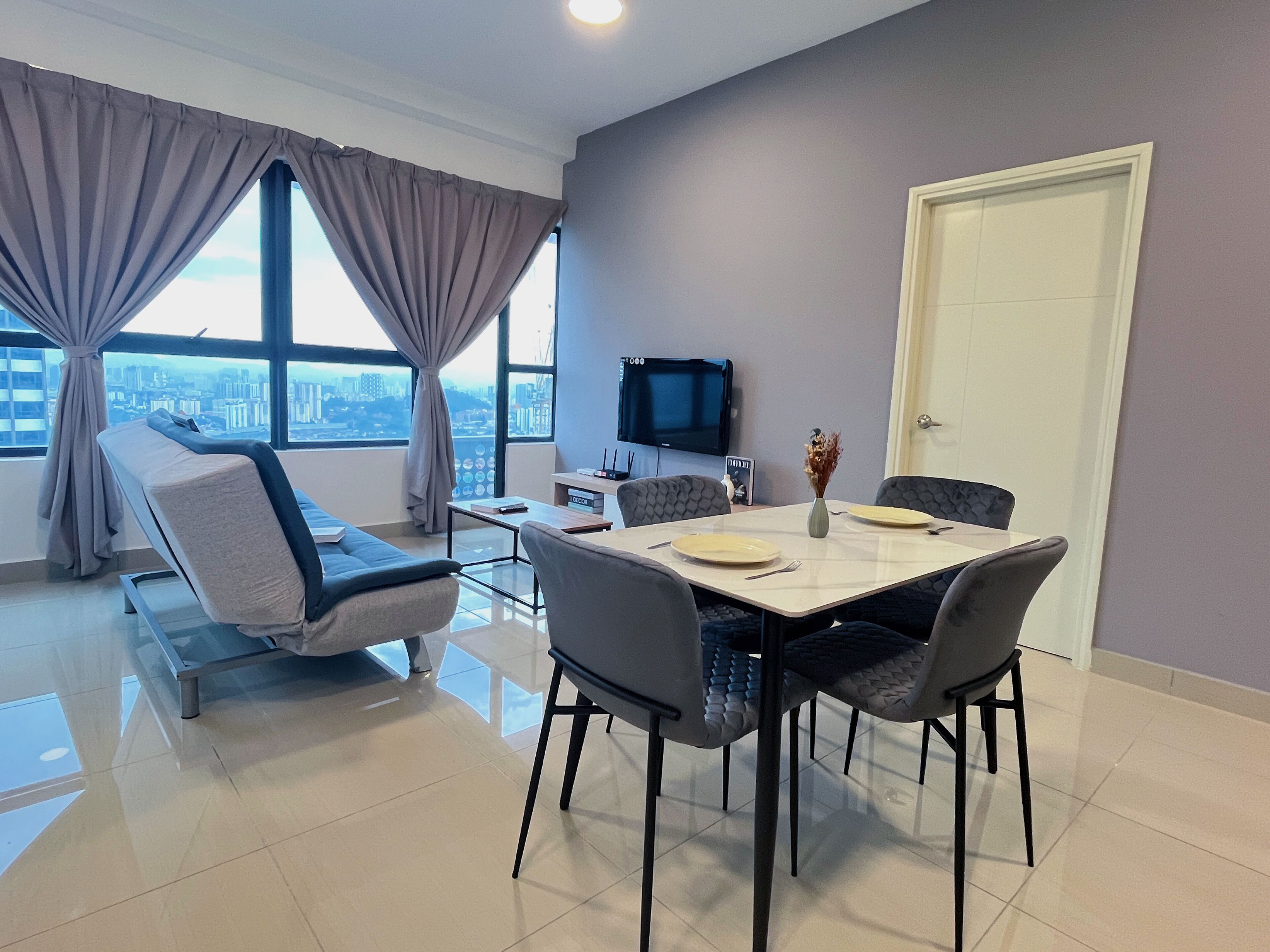 Apartamento, 2 quartos | Sala de estar | Televisor de ecrã plano de 40 polegadas com canais por cabo 
