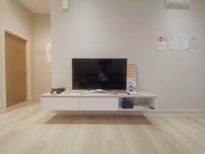 Casa, 3 quartos | Área de estar | TV de tela plana 40 polegadas com canais a cabo