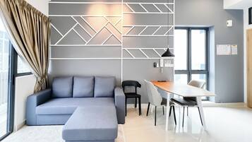 Apartamento, 2 quartos | Área de estar | TV de tela plana 40 polegadas com canais a cabo