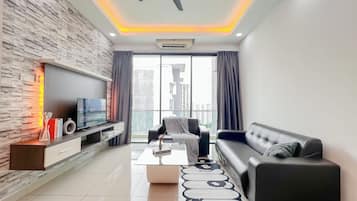 Apartamento, 3 quartos | Área de estar