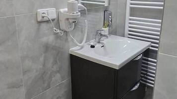 Apartamento, 1 quarto, para fumantes | Banheiro