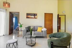 Apartamento Deluxe em Condomínio Fechado, vista para o mar | Sala de estar