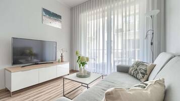 Apartamento Deluxe, 2 quartos | Sala