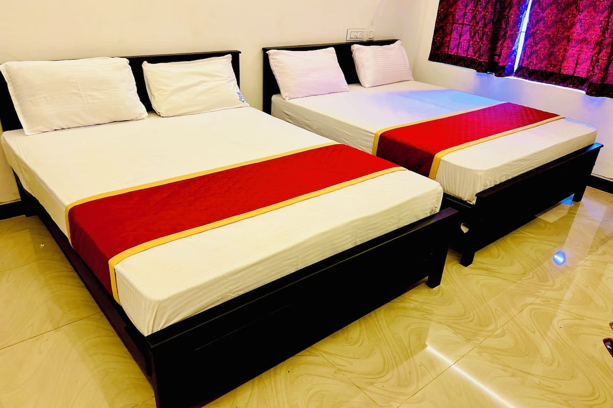 Quarto Quádruplo Executivo | Wi-fi grátis, roupa de cama fornecida