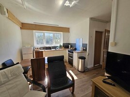 Apartamento | Área de estar | TV