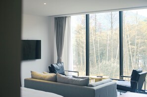 Suite-Estúdio Comfort, 1 cama king-size, vista para o jardim | Roupa de alta qualidade, edredões de penas, minibar, cofre no quarto 