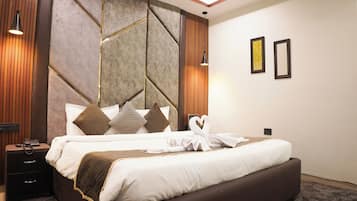 Quarto casal luxo | 1 quarto, frigobar, Wi-Fi de cortesia