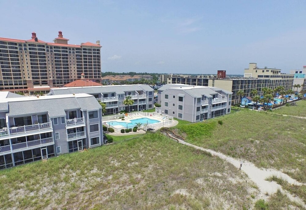 NEW! Sea Cloisters 305E (2-Bedroom Condo) with Pool and Beach view ...