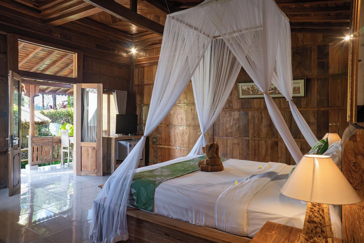 Villa Deluxe, varanda, vista para o jardim | 1 quarto, minibar, cofre no quarto, secretária