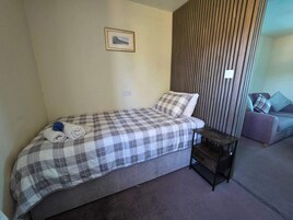 2 quartos, Wi-Fi de cortesia, roupa de cama