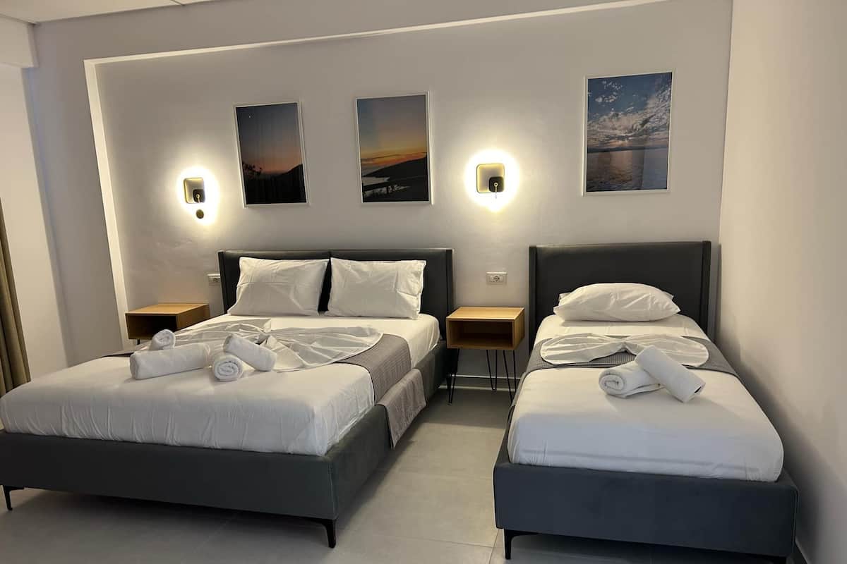 Quarto Triplo Básico | 1 quarto, ferro/tábua de engomar, Wi-fi grátis