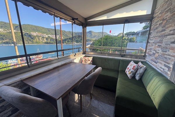 Quarto quádruplo luxo, 2 quartos, vista para o mar | Terraço/pátio