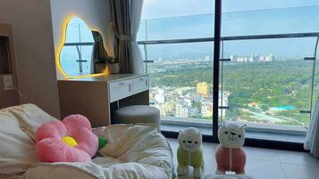 Apartamento Deluxe, vista parcial para o mar | Vista do quarto