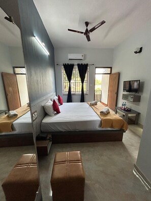 Quarto Deluxe | Roupa de cama fornecida