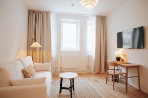 Apartamento Deluxe | Sala de estar