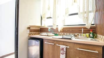 Loft júnior | Cozinha americana privada | Frigobar, micro-ondas, cooktop, talheres/pratos/utensílios de cozinha