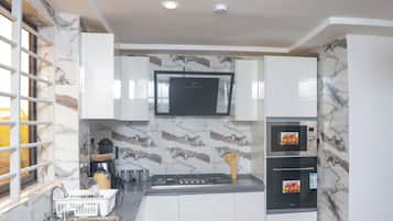 Vila | Cozinha privada | Geladeira, micro-ondas, fogão, cooktop