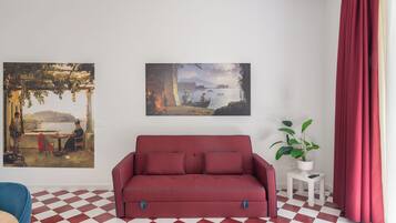 Apartamento | Sala de estar | Smart TV, Netflix, livros, serviços de streaming