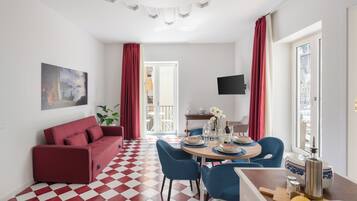 Apartamento | Sala de estar | Smart TV, Netflix, livros, serviços de streaming