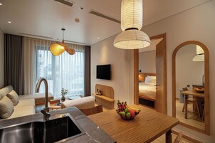 Apartamento Deluxe, 1 quarto | Secretária, secretária adequada para computadores portáteis 