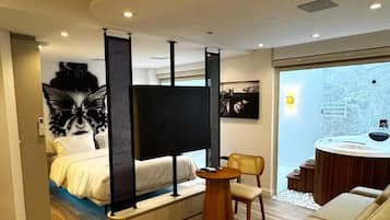 Suite Deluxe, no rés do chão | 1 quarto, roupa de alta qualidade, camas de colchão Select Comfort