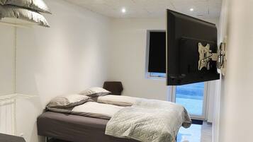 2 quartos, berço de viagem, Wi-Fi de cortesia, roupa de cama