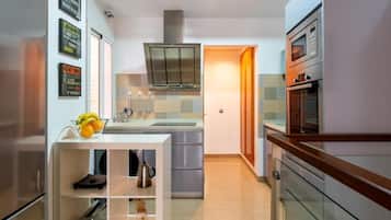 Apartamento, 1 quarto, sacada, vista para a cidade | Cozinha privada