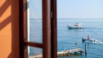 Suite Júnior, varanda, vista para o lago | 1 quarto, cofre no quarto, Wi-fi grátis