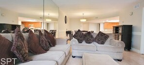 Apartamento, 2 quartos | Área de estar