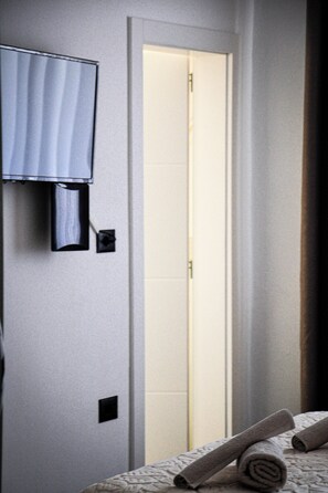 Cortinas blackout, quartos à prova de som, Wi-Fi de cortesia