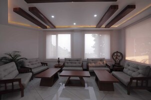 Quarto Comfort, vista para a montanha | Sala de estar