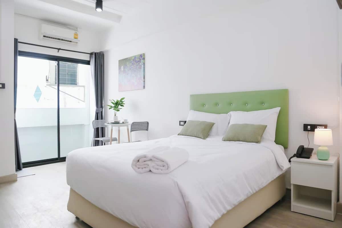 Quarto Deluxe | Roupa de cama fornecida