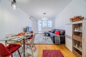 Apartamento Familiar, 1 quarto (Modern Oasis With Terrace) | Sala de jantar