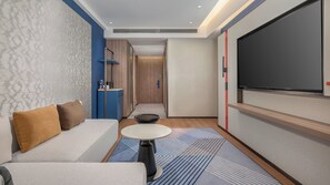 Suíte, 1 quarto | Edredons de pluma, escrivaninha, cortinas blackout