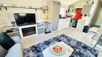 Loft, 3 quartos, fumadores, varanda | Sala | Livros
