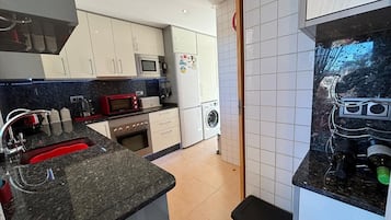 Vila | Cozinha privada | Geladeira, micro-ondas, fogão, cooktop