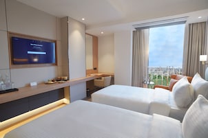 Minibar, ferro/tábua de engomar, Wi-fi grátis, roupa de cama fornecida 