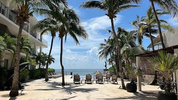 Apartamento Comfort, vista para a praia | Sala de estar