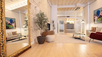 Apartamento (1 Bedroom) | Sala de estar | Televisor