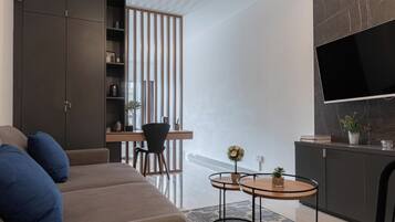 Apartamento Deluxe, varanda, Vista para a cidade | Sala de estar