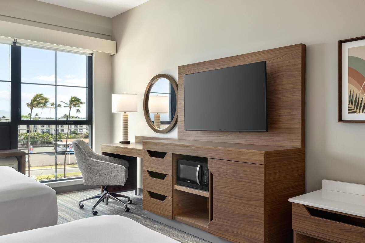 Roupas de cama premium, cortinas blackout, Wi-Fi de cortesia