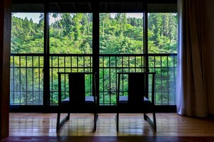 Quarto Quádruplo Standard, vista para o jardim | Wi-fi grátis 