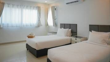 Quarto Twin Superior | Cortinas/cortinados opacos, Wi-fi grátis, roupa de cama fornecida