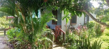 Quarto Quádruplo Comfort, vista para o jardim | Vista para o jardim