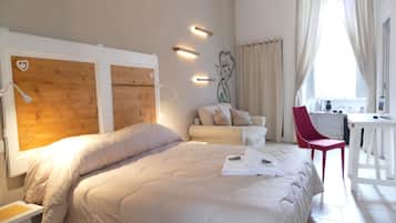Suite-Estúdio Exclusiva, vista para o pátio | 1 quarto, quartos insonorizados, ferro/tábua de engomar, Wi-fi grátis