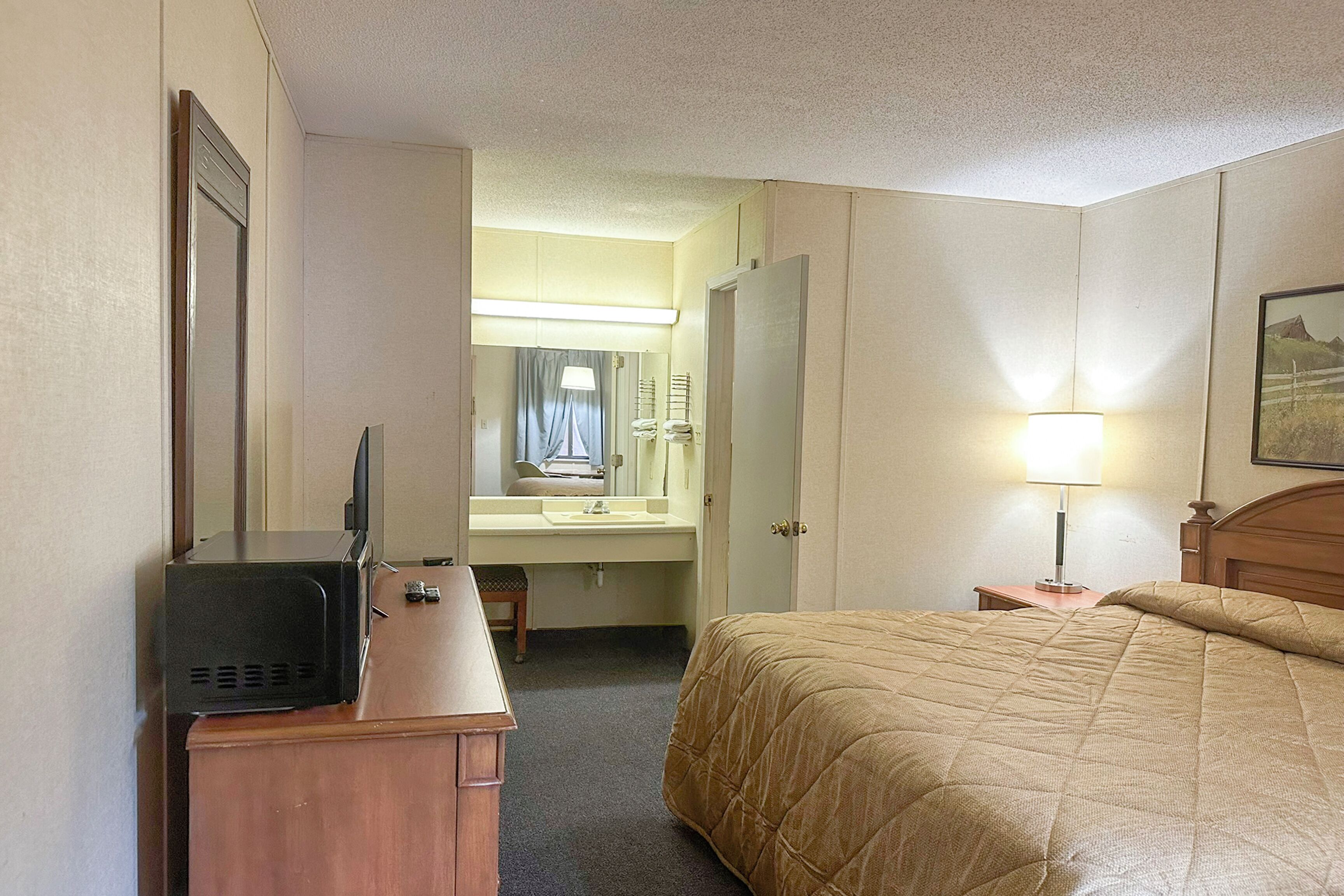 Minibar, secretária, ferro/tábua de engomar, Wi-fi grátis 